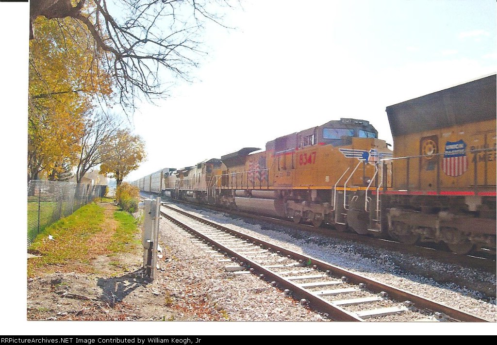 UP 8347 is the second unit on a Frieght train at Gentile road